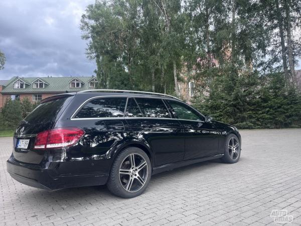 Black Mercedes-Benz E 300 2013 in Raseiniai, with an engine capacity of 2.10 L and mileage of 449 thousand km for 6600 €, photo 5 on AUTOMOTO.COM.LV