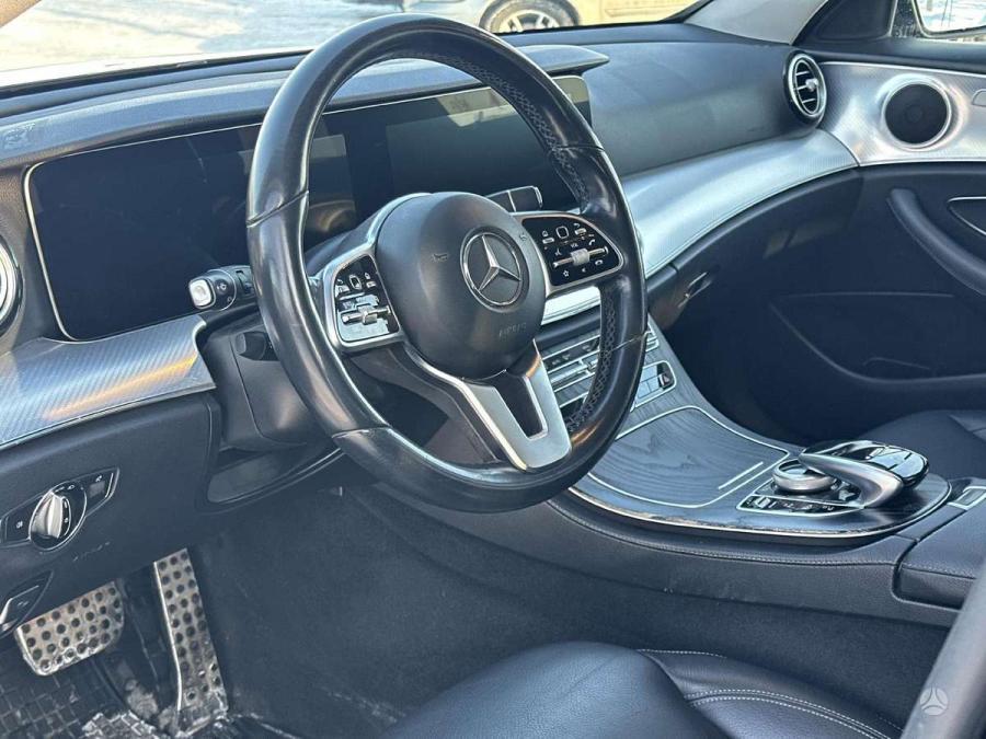 Black Mercedes-Benz E 300 2019 in Kaunas, with an engine capacity of 1.95 L and mileage of 237 thousand km for 14299 €, photo 7 on AUTOMOTO.COM.LV