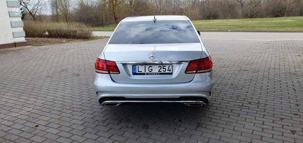 Grey Mercedes-Benz E 300 2014 in Panevezys, with an engine capacity of 2.99 L and mileage of 401 thousand km for 8990 €, photo 6 on AUTOMOTO.COM.LV