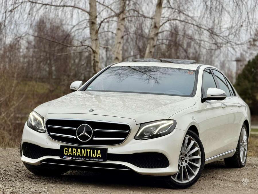 White Mercedes-Benz E 300 2019 in Siauliai, with an engine capacity of 2.00 L and mileage of 158 thousand km for 24999 €, photo 1 on AUTOMOTO.COM.LV