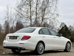 White Mercedes-Benz E 300 2019 in Siauliai, with an engine capacity of 2.00 L and mileage of 158 thousand km for 24999 €, photo 4 on AUTOMOTO.COM.LV