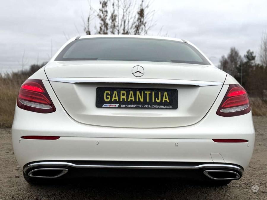 White Mercedes-Benz E 300 2019 in Siauliai, with an engine capacity of 2.00 L and mileage of 158 thousand km for 24999 €, photo 6 on AUTOMOTO.COM.LV