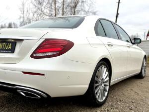 White Mercedes-Benz E 300 2019 in Siauliai, with an engine capacity of 2.00 L and mileage of 158 thousand km for 24999 €, photo 8 on AUTOMOTO.COM.LV
