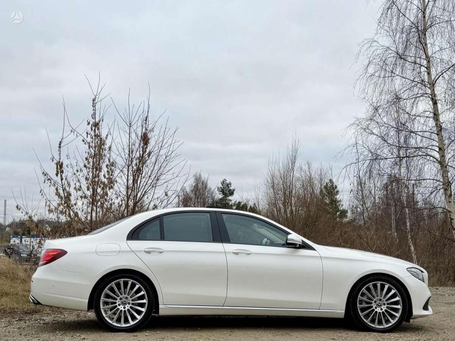 White Mercedes-Benz E 300 2019 in Siauliai, with an engine capacity of 2.00 L and mileage of 158 thousand km for 24999 €, photo 14 on AUTOMOTO.COM.LV