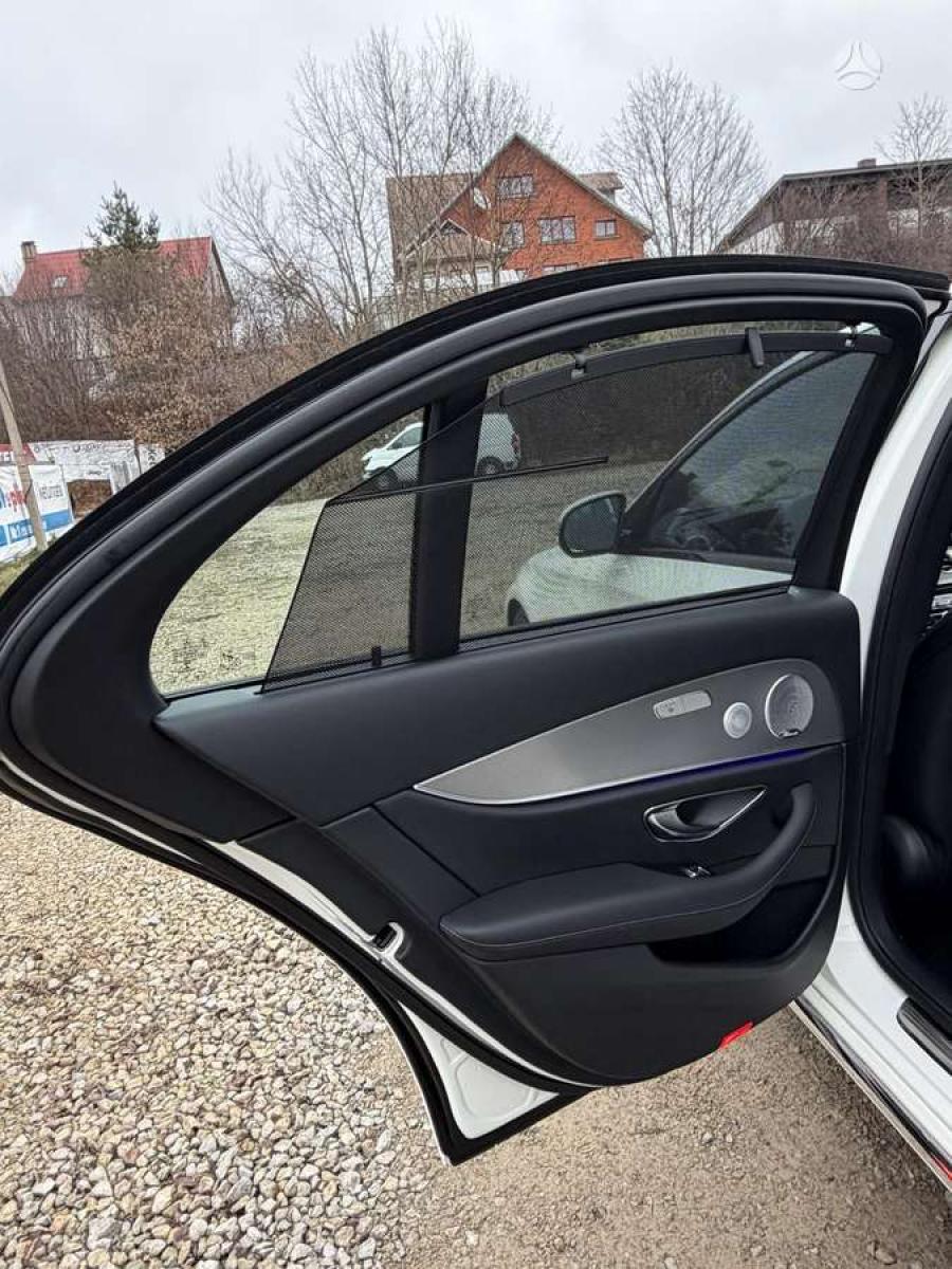White Mercedes-Benz E 300 2019 in Siauliai, with an engine capacity of 2.00 L and mileage of 158 thousand km for 24999 €, photo 34 on AUTOMOTO.COM.LV