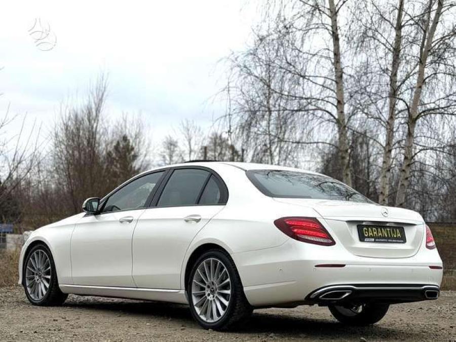 White Mercedes-Benz E 300 2019 in Siauliai, with an engine capacity of 1.95 L and mileage of 158 thousand km for 24999 €, photo 3 on AUTOMOTO.COM.LV