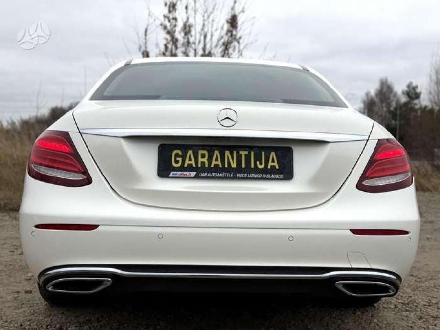 White Mercedes-Benz E 300 2019 in Siauliai, with an engine capacity of 1.95 L and mileage of 158 thousand km for 24999 €, photo 6 on AUTOMOTO.COM.LV