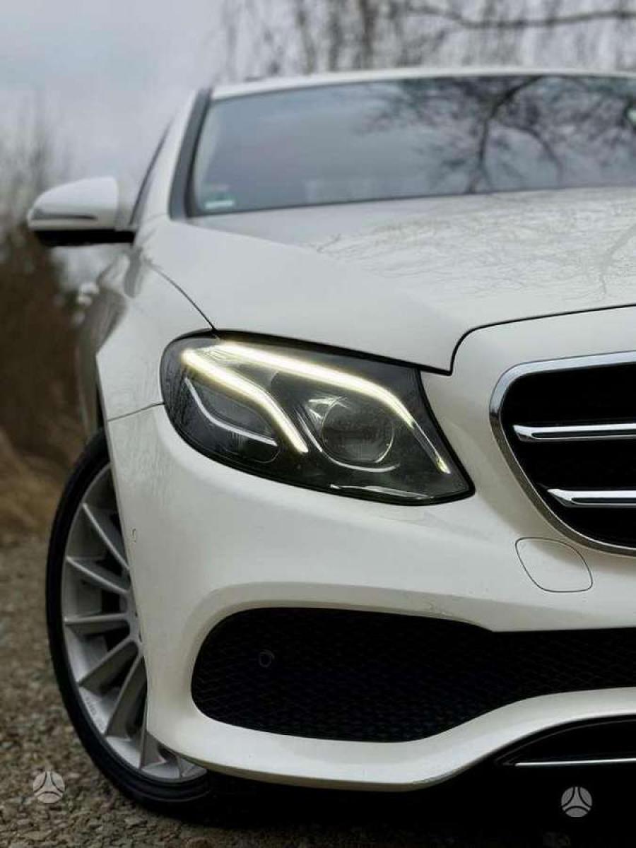 White Mercedes-Benz E 300 2019 in Siauliai, with an engine capacity of 1.95 L and mileage of 158 thousand km for 24999 €, photo 15 on AUTOMOTO.COM.LV