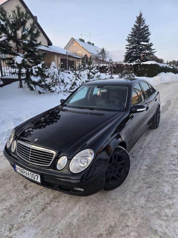 Black Mercedes-Benz E 320 2005 in Vilnius, with an engine capacity of 3.22 L and mileage of 246 thousand km for 2450 €, photo 7 on AUTOMOTO.COM.LV