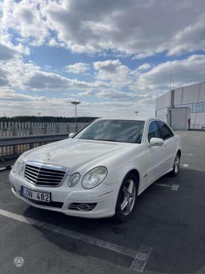 Balts Mercedes-Benz E 320 2007 Viļņa, ar dzinēja tilpumu 3.00 L un nobraukumu 360 tūkst. km par 3700 €, foto  vietnē AUTOMOTO.COM.LV