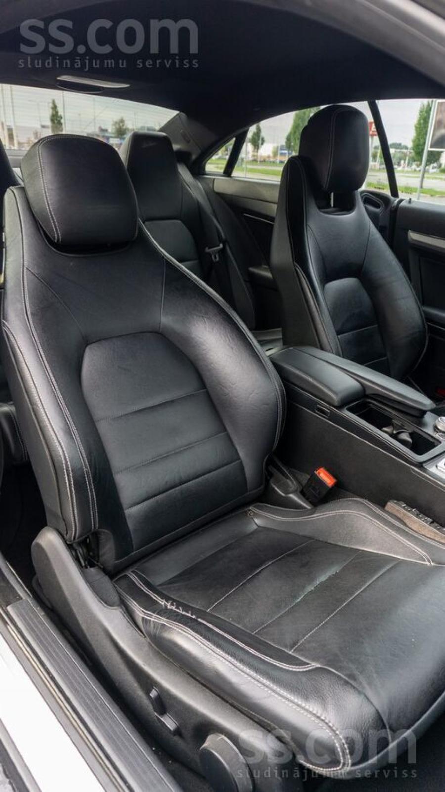 Black Mercedes-Benz E 350 2009 in Riga, with an engine capacity of 3.00 L and mileage of 297 thousand km for 6990 €, photo 24 on AUTOMOTO.COM.LV
