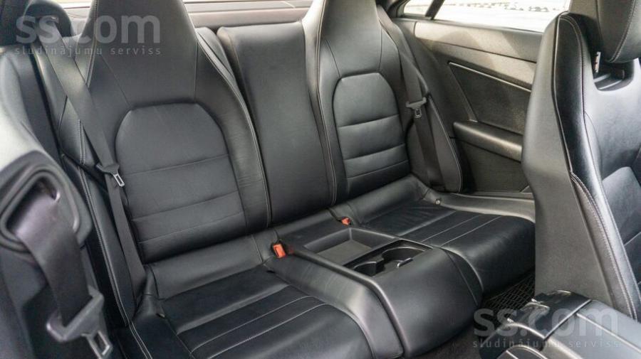 Black Mercedes-Benz E 350 2009 in Riga, with an engine capacity of 3.00 L and mileage of 297 thousand km for 6990 €, photo 25 on AUTOMOTO.COM.LV
