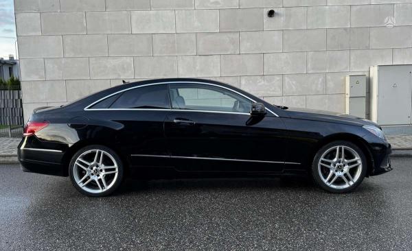 Black Mercedes-Benz E 350 2014 in Vilnius, with an engine capacity of 3.50 L and mileage of 179 thousand km for 8399 €, photo 3 on AUTOMOTO.COM.LV