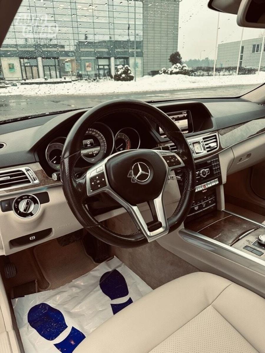 Black Mercedes-Benz E 350 2014 in Panevezys, with an engine capacity of 3.50 L and mileage of 190 thousand km for 12999 €, photo 6 on AUTOMOTO.COM.LV