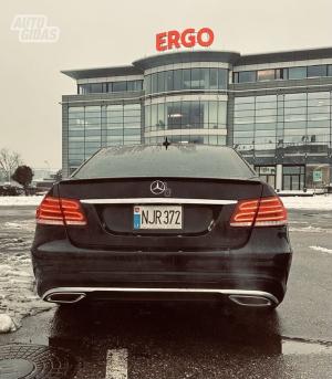 Black Mercedes-Benz E 350 2014 in Panevezys, with an engine capacity of 3.50 L and mileage of 190 thousand km for 12999 €, photo 12 on AUTOMOTO.COM.LV