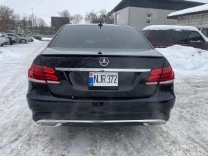 Black Mercedes-Benz E 350 2014 in Panevezys, with an engine capacity of 3.50 L and mileage of 190 thousand km for 12999 €, photo 21 on AUTOMOTO.COM.LV
