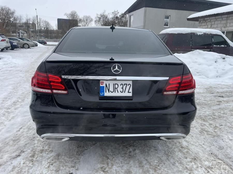 Black Mercedes-Benz E 350 2014 in Panevezys, with an engine capacity of 3.50 L and mileage of 190 thousand km for 12999 €, photo 21 on AUTOMOTO.COM.LV