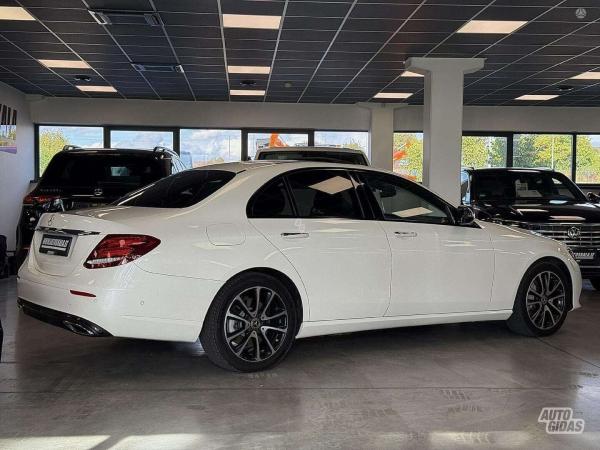 White Mercedes-Benz E 400 2018 in Klaipeda, with an engine capacity of 2.90 L and mileage of 283 thousand km for 23950 €, photo 2 on AUTOMOTO.COM.LV