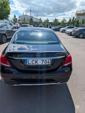 Black Mercedes-Benz E 450 2019 in Kaunas, with an engine capacity of 3.00 L and mileage of 220 thousand km for 30500 €, photo 7 on AUTOMOTO.COM.LV