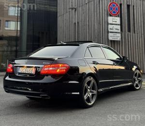 Black Mercedes-Benz e-500 2011 in Riga, with an engine capacity of 5.00 L and mileage of 232 thousand km for 9350 €, photo 5 on AUTOMOTO.COM.LV