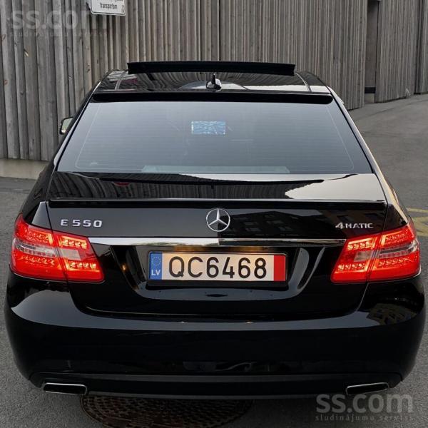 Black Mercedes-Benz e-500 2011 in Riga, with an engine capacity of 5.00 L and mileage of 232 thousand km for 9350 €, photo 5 on AUTOMOTO.COM.LV