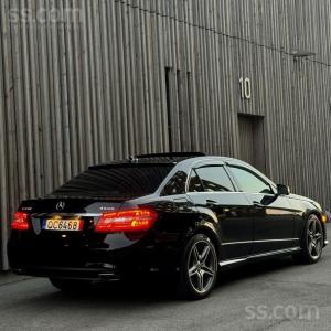Black Mercedes-Benz e-500 2011 in Riga, with an engine capacity of 5.00 L and mileage of 232 thousand km for 9350 €, photo 9 on AUTOMOTO.COM.LV