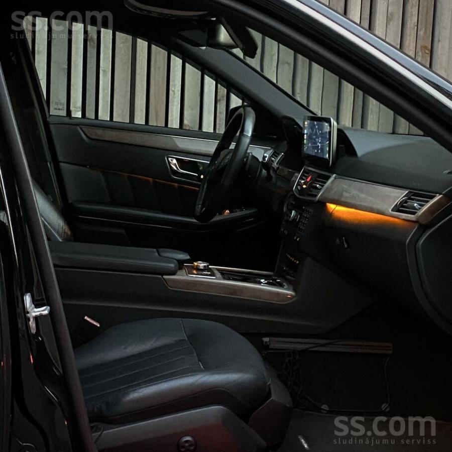 Black Mercedes-Benz e-500 2011 in Riga, with an engine capacity of 5.00 L and mileage of 232 thousand km for 9350 €, photo 10 on AUTOMOTO.COM.LV