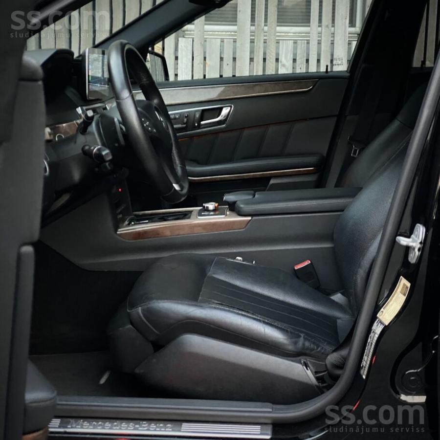Black Mercedes-Benz e-500 2011 in Riga, with an engine capacity of 5.00 L and mileage of 232 thousand km for 9350 €, photo 16 on AUTOMOTO.COM.LV