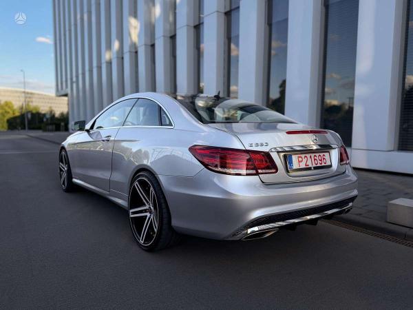 Grey Mercedes-Benz E 550 2014 in Vilnius, with an engine capacity of 4.70 L and mileage of 110 thousand km for 14900 €, photo 5 on AUTOMOTO.COM.LV