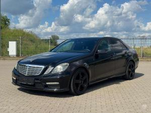 Black Mercedes-Benz E 63 AMG 2009 in Marijampole, with an engine capacity of 6.21 L and mileage of 263 thousand km for 13850 €, photo  on AUTOMOTO.COM.LV