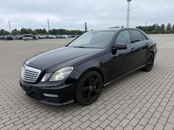 Black Mercedes-Benz E 63 AMG 2009 in Marijampole, with an engine capacity of 6.21 L and mileage of 279 thousand km for 14450 €, photo 1 on AUTOMOTO.COM.LV