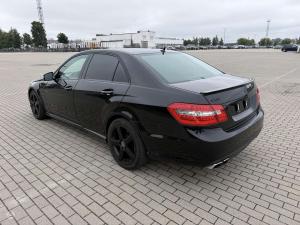Black Mercedes-Benz E 63 AMG 2009 in Marijampole, with an engine capacity of 6.21 L and mileage of 279 thousand km for 14450 €, photo 5 on AUTOMOTO.COM.LV