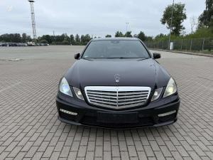 Black Mercedes-Benz E 63 AMG 2009 in Marijampole, with an engine capacity of 6.21 L and mileage of 279 thousand km for 14450 €, photo 6 on AUTOMOTO.COM.LV