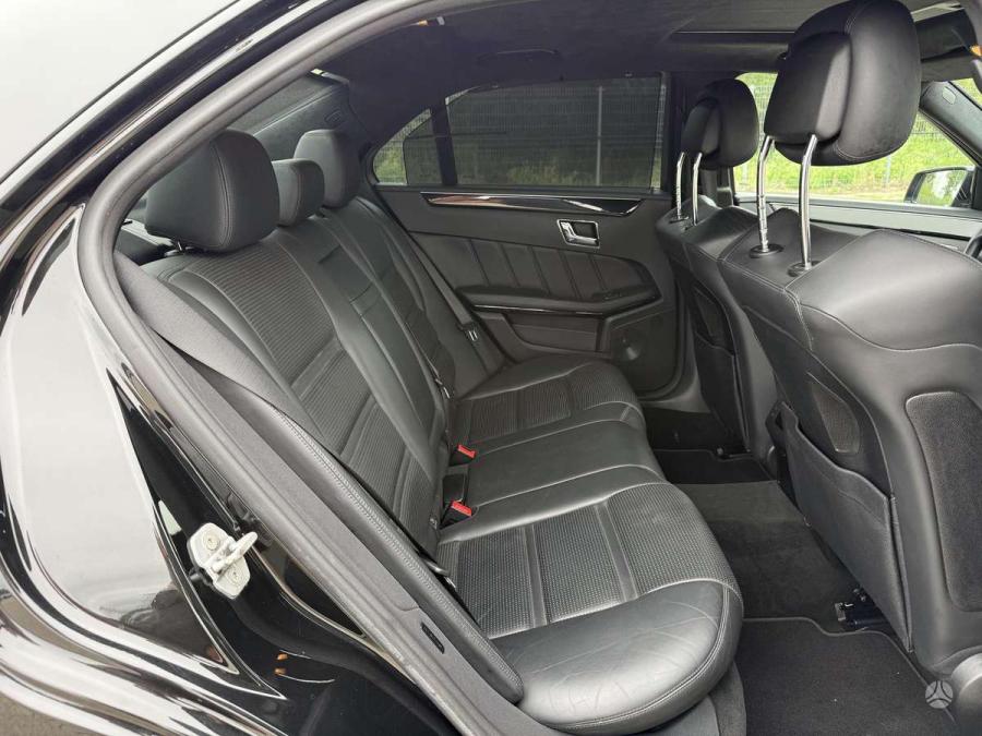 Black Mercedes-Benz E 63 AMG 2009 in Marijampole, with an engine capacity of 6.21 L and mileage of 279 thousand km for 14450 €, photo 24 on AUTOMOTO.COM.LV