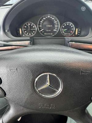 Grey Mercedes-Benz E 63 AMG 2008 in Siauliai, with an engine capacity of 6.20 L and mileage of 186 thousand km for 21000 €, photo 14 on AUTOMOTO.COM.LV
