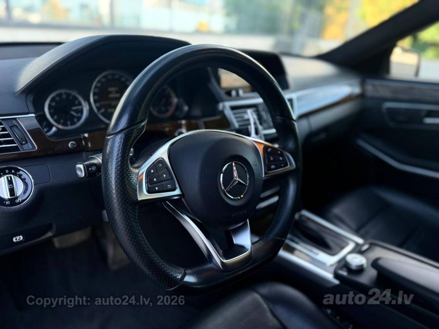 Black Mercedes-Benz E-Class 2009 in Tallinn, with an engine capacity of 2.10 L and mileage of 296 thousand km for 6499 €, photo 13 on AUTOMOTO.COM.LV