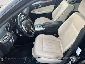 Black Mercedes-Benz E-Class 2015 in Tallinn, with an engine capacity of 4.70 L and mileage of 294 thousand km for 14900 €, photo 11 on AUTOMOTO.COM.LV
