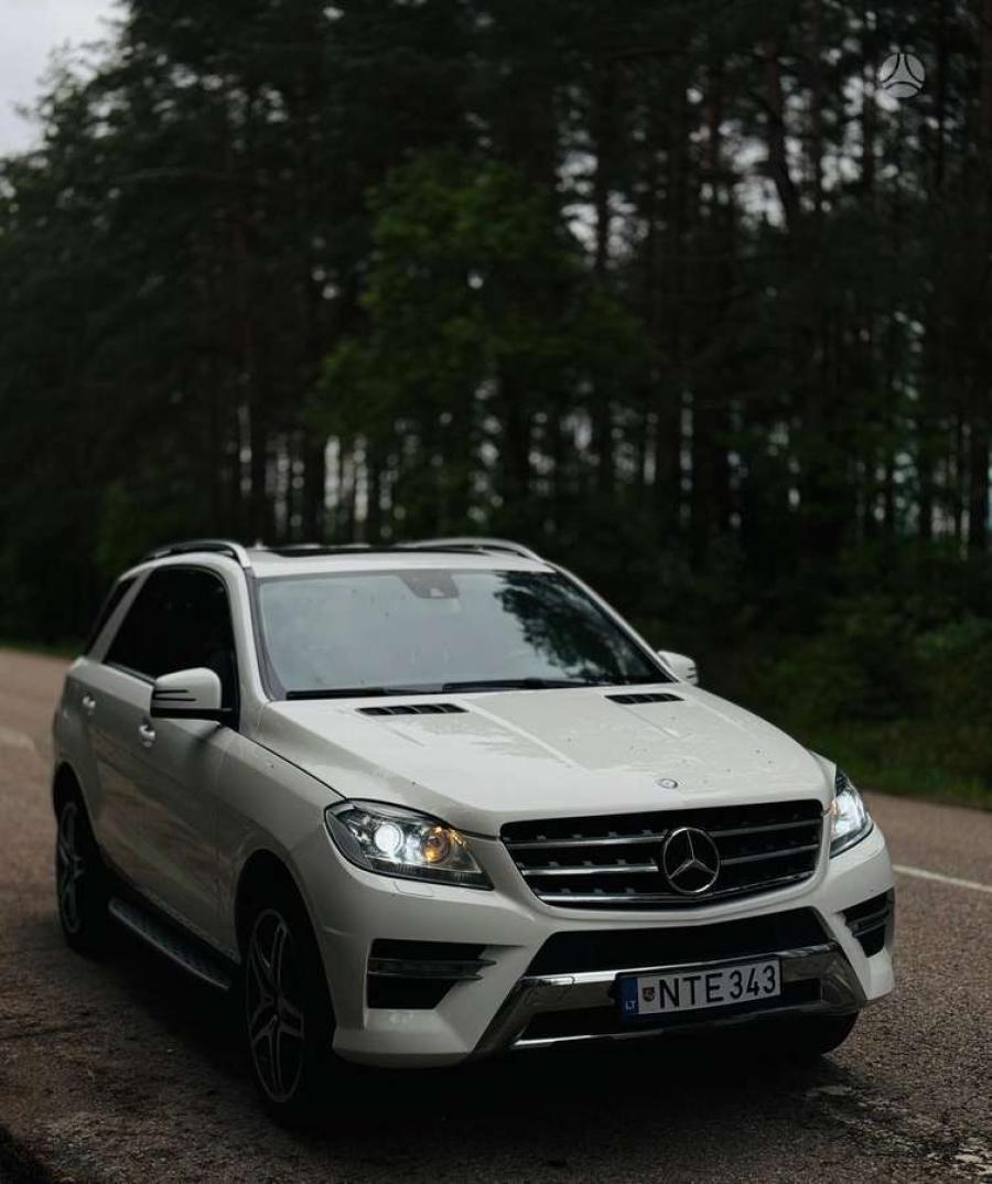 Белый Мерседес Г 350 2015 в Вильнюс, объемом двигателя 3.00 л и пробегом 274 тыс. км за 13490 €, фото 3 на AUTOMOTO.COM.LV