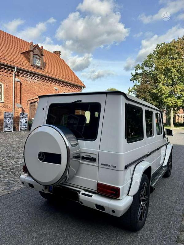 White Mercedes-Benz g-55-amg 2005 in Kaunas, with an engine capacity of 0.00 L and mileage of 176 thousand km for 49700 €, photo 6 on AUTOMOTO.COM.LV