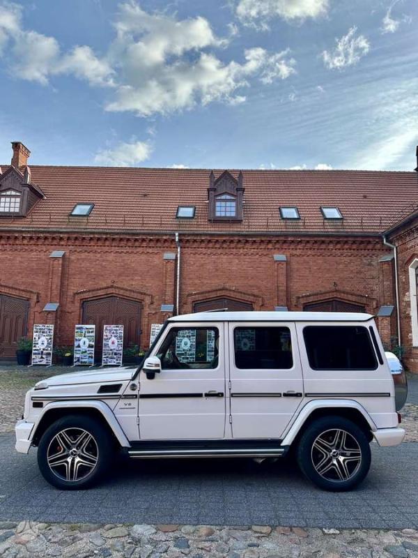 White Mercedes-Benz g-55-amg 2005 in Kaunas, with an engine capacity of 0.00 L and mileage of 176 thousand km for 49700 €, photo 9 on AUTOMOTO.COM.LV