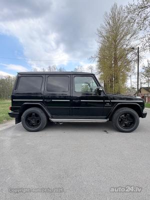 Black Mercedes-Benz G-Class 2004 in Tallinn, with an engine capacity of 5.40 L and mileage of 202 thousand km for 39900 €, photo 4 on AUTOMOTO.COM.LV