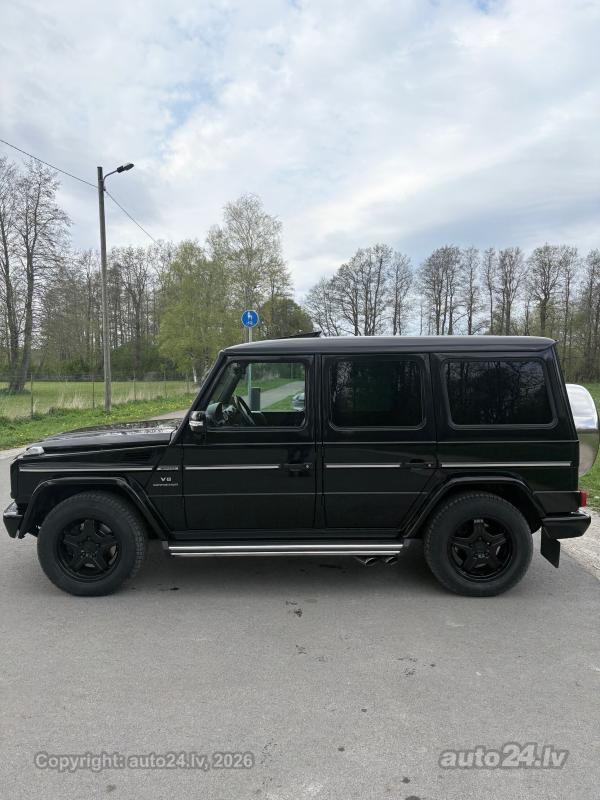 Melns Mercedes-Benz G-Class 2004 Tallina, ar dzinēja tilpumu 5.40 L un nobraukumu 202 tūkst. km par 39900 €, foto 4 vietnē AUTOMOTO.COM.LV