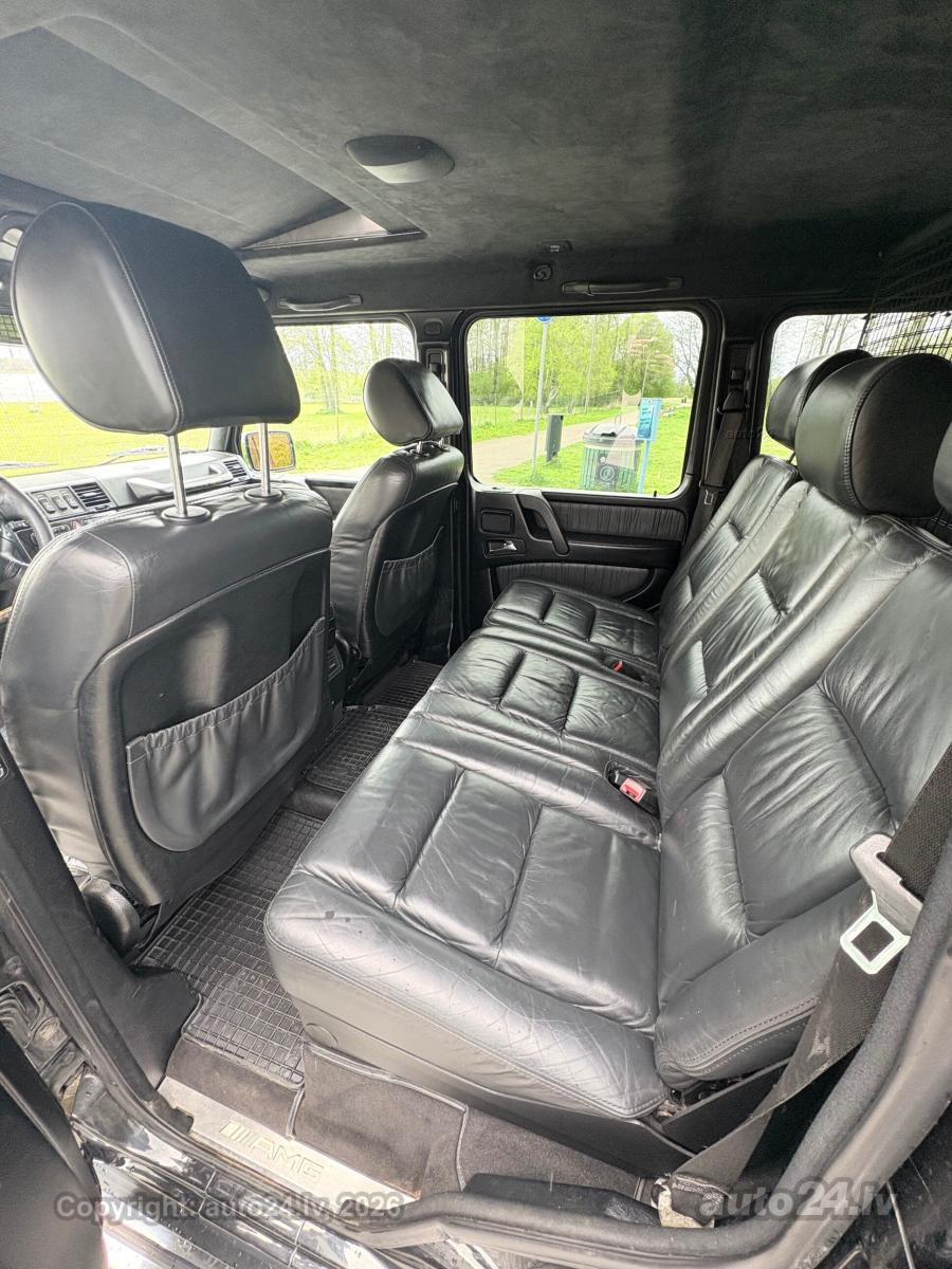 Black Mercedes-Benz G-Class 2004 in Tallinn, with an engine capacity of 5.40 L and mileage of 202 thousand km for 39900 €, photo 18 on AUTOMOTO.COM.LV