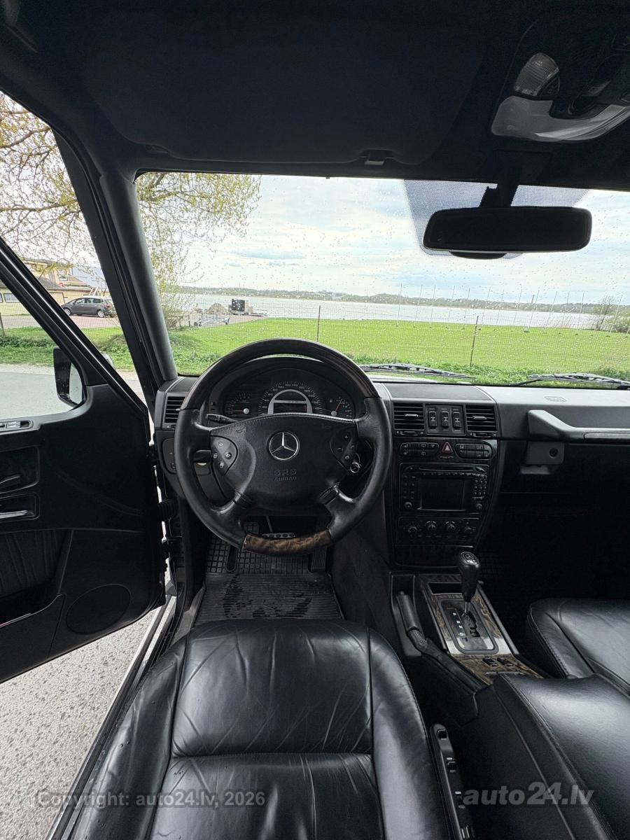 Black Mercedes-Benz G-Class 2004 in Tallinn, with an engine capacity of 5.40 L and mileage of 202 thousand km for 39900 €, photo 20 on AUTOMOTO.COM.LV