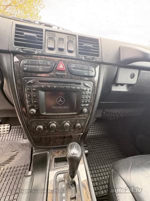 Black Mercedes-Benz G-Class 2004 in Tallinn, with an engine capacity of 5.40 L and mileage of 202 thousand km for 39900 €, photo 24 on AUTOMOTO.COM.LV