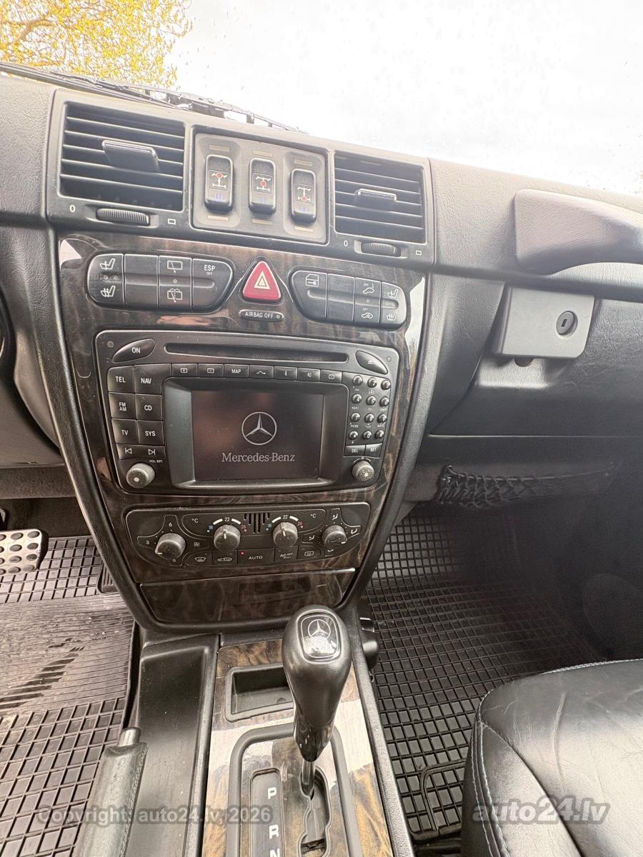 Black Mercedes-Benz G-Class 2004 in Tallinn, with an engine capacity of 5.40 L and mileage of 202 thousand km for 39900 €, photo 24 on AUTOMOTO.COM.LV