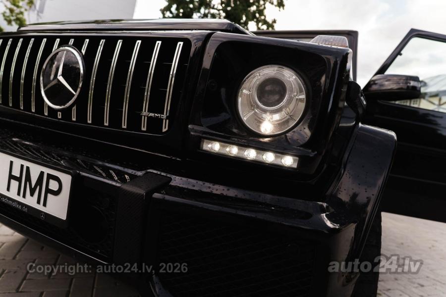 Melns Mercedes-Benz G-Class 2004 Tartu, ar dzinēja tilpumu 5.00 L un nobraukumu 214 tūkst. km par 28000 €, foto 23 vietnē AUTOMOTO.COM.LV