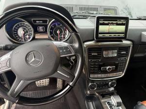 Black Mercedes-Benz G63 AMG 2013 in Vilnius, with an engine capacity of 5.50 L and mileage of 178 thousand km for 43000 €, photo 10 on AUTOMOTO.COM.LV