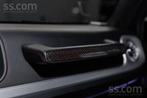 Black Mercedes-Benz G63 AMG 2019 in Riga, with an engine capacity of 4.00 L and mileage of 102 thousand km for 125000 €, photo 21 on AUTOMOTO.COM.LV