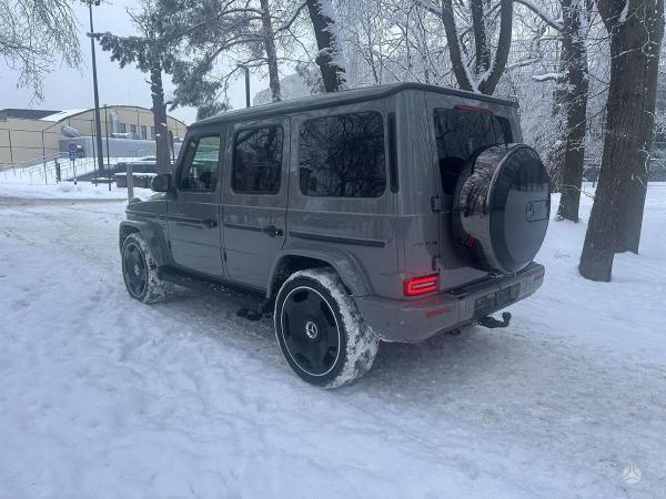Grey Mercedes-Benz G63 AMG 2025 in Kaunas, with an engine capacity of 3.98 L and mileage of 19 thousand km for 242000 €, photo 5 on AUTOMOTO.COM.LV
